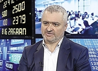Ionuţ Pătrăhău şi-a dat demisia de la conducerea Băncii Carpatica ...